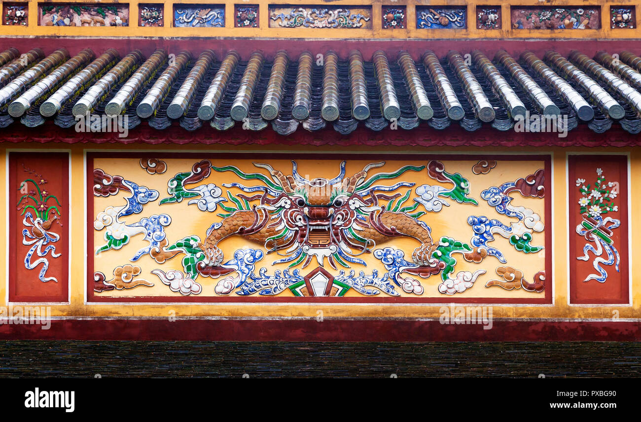 Dragon relief in Imperial Palace in Hue, Vietnam Stock Photo - Alamy