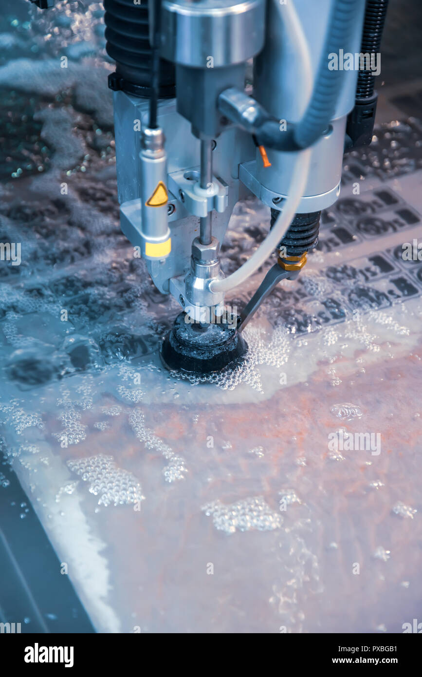 CNC water jet cutting machine modern industrial technology Stock Photo ...