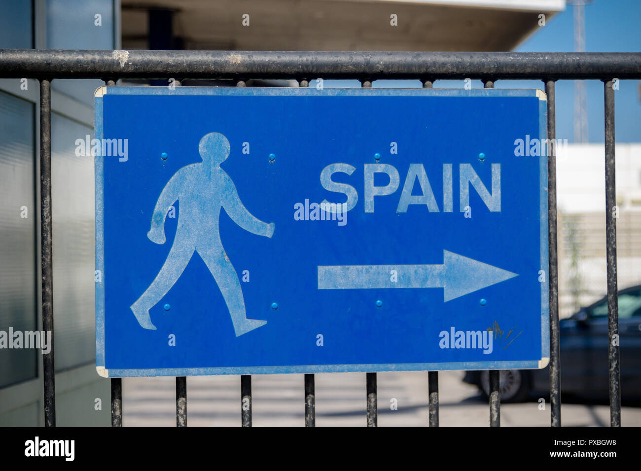 Sign pointing to Spain at the Border with Gibraltar a British overseas ...