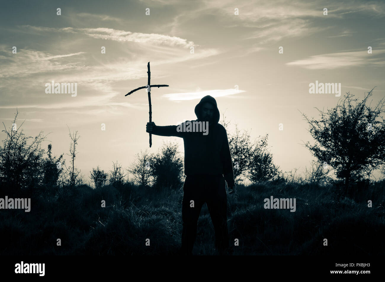 Holding wooden cross hi-res stock photography and images - Alamy