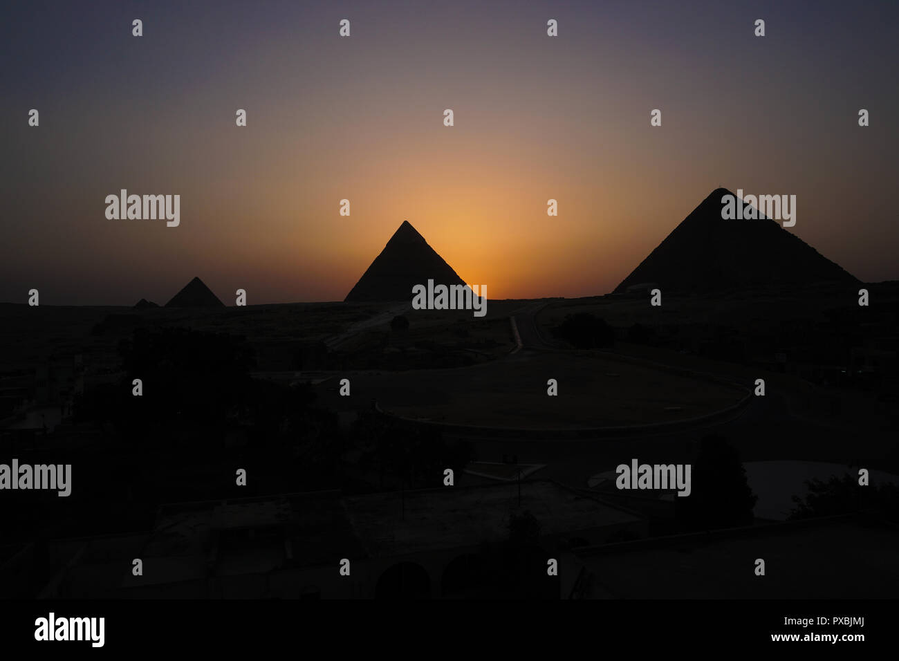 sunset at the Pyramids of Giza Stock Photo - Alamy
