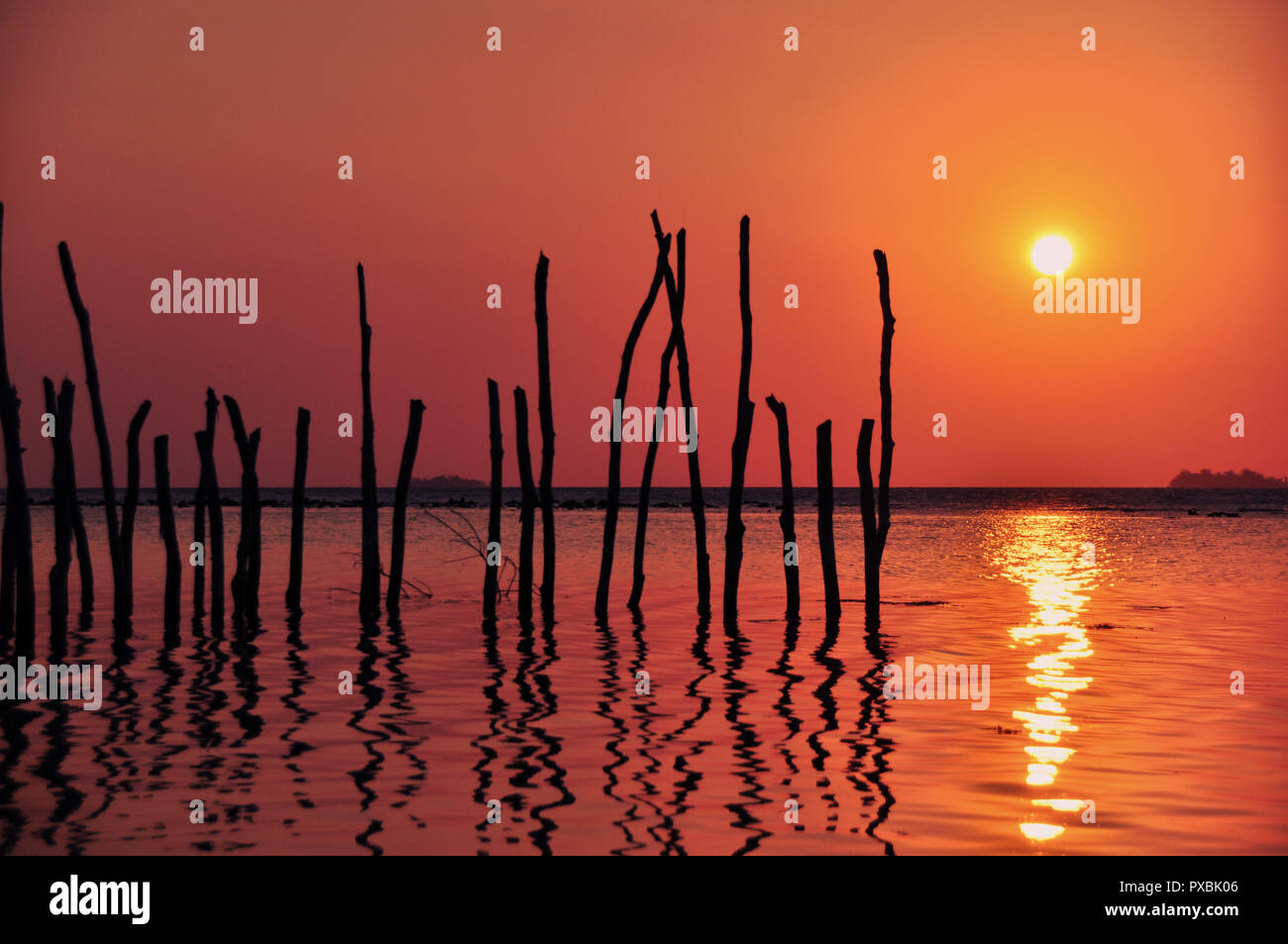 Sunset in Indonesia Stock Photo - Alamy