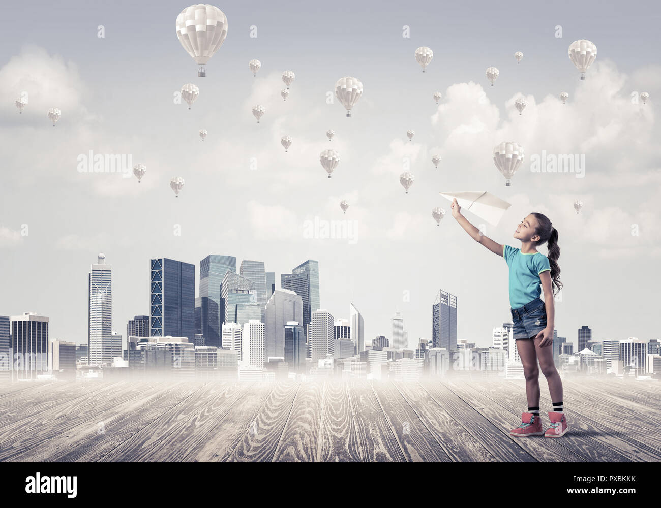 Concept of careless happy childhood with girl dreaming about som Stock ...