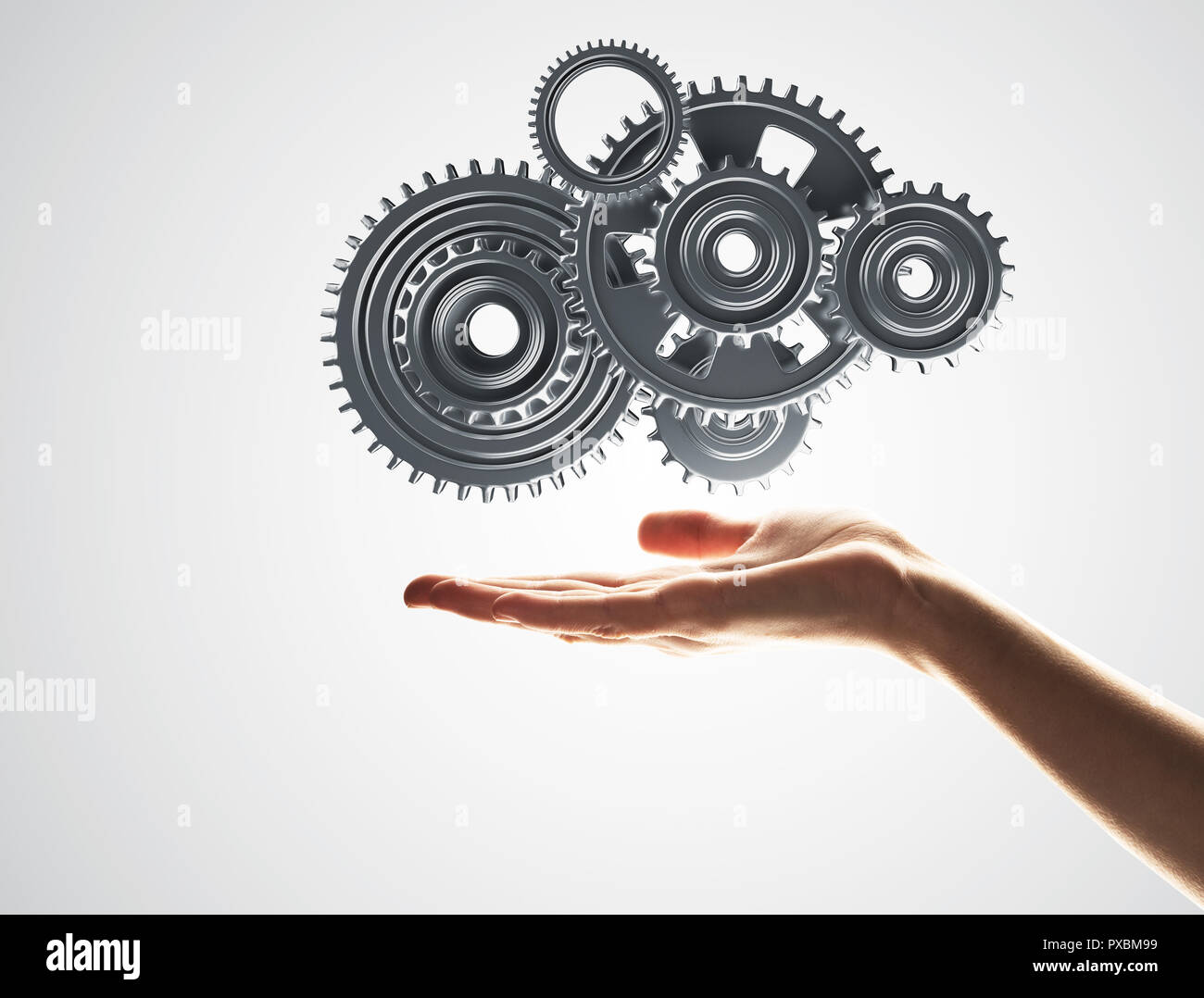 Concept of teamwork and cooperation presented with working gear engine ...