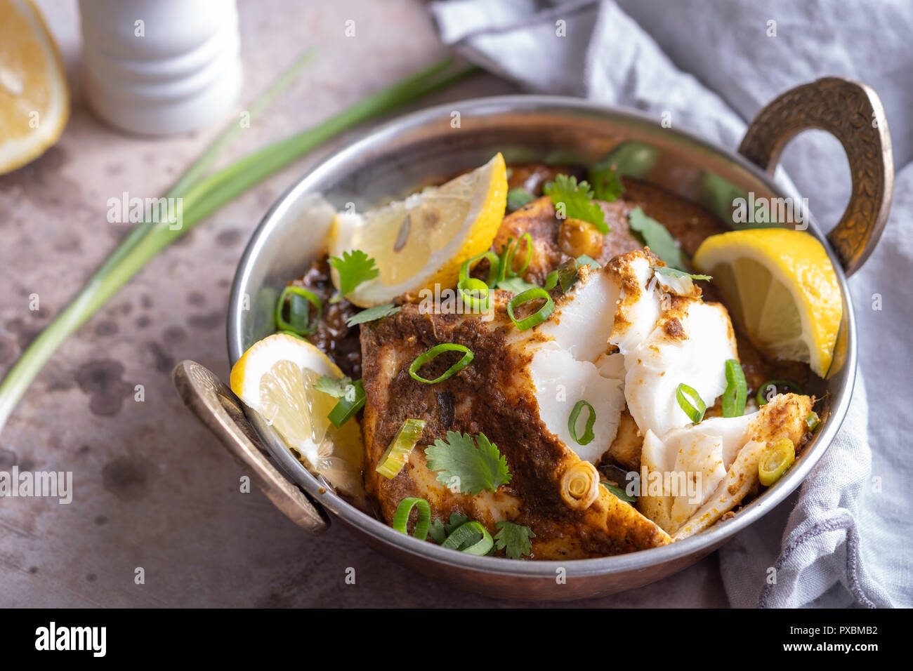 Spicy and tasty Fish curry dish Stock Photo - Alamy