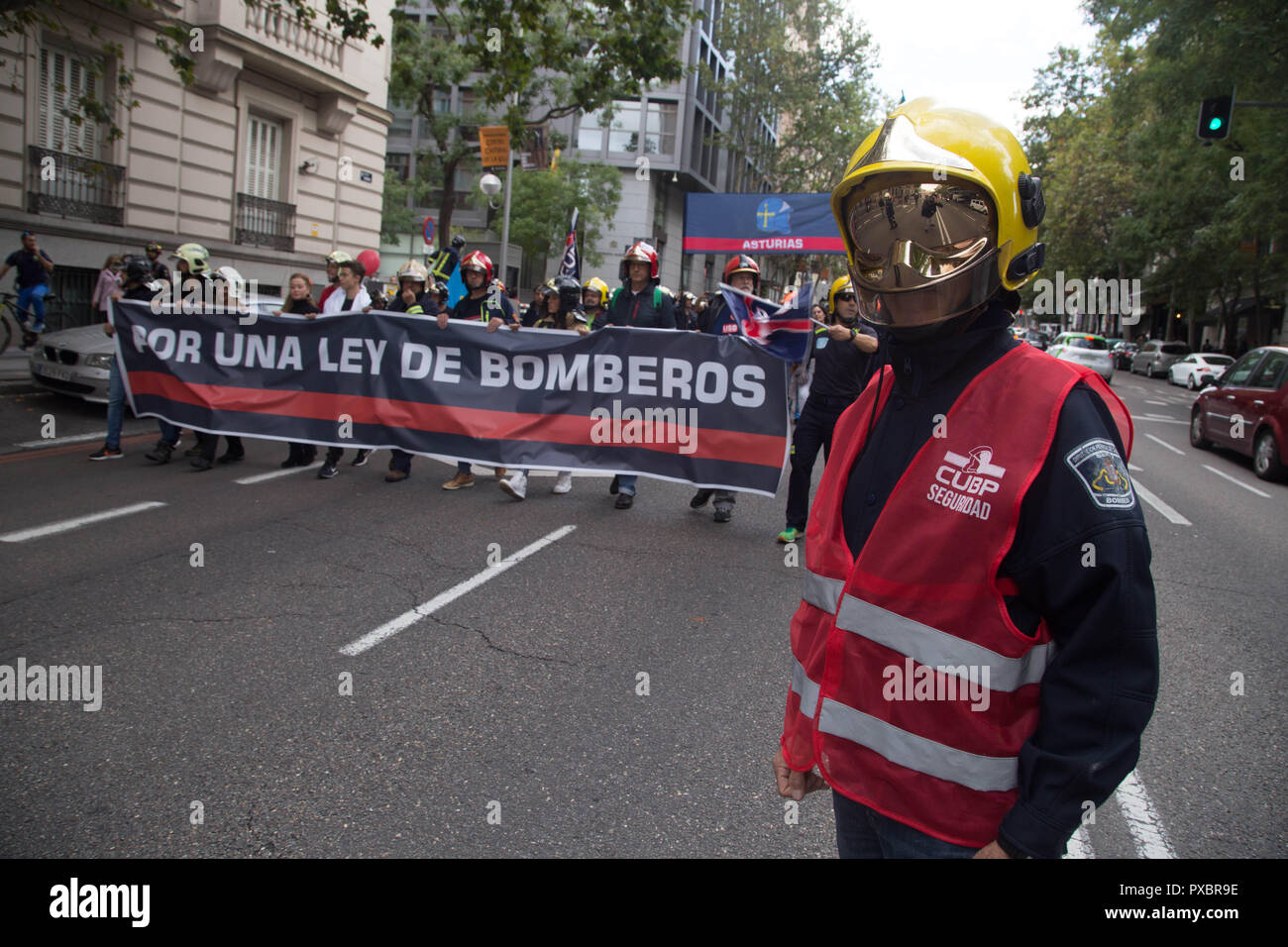 Madrid, Spain. 20th Oct, 2018. Firefighter seen in an helmet posing for ...