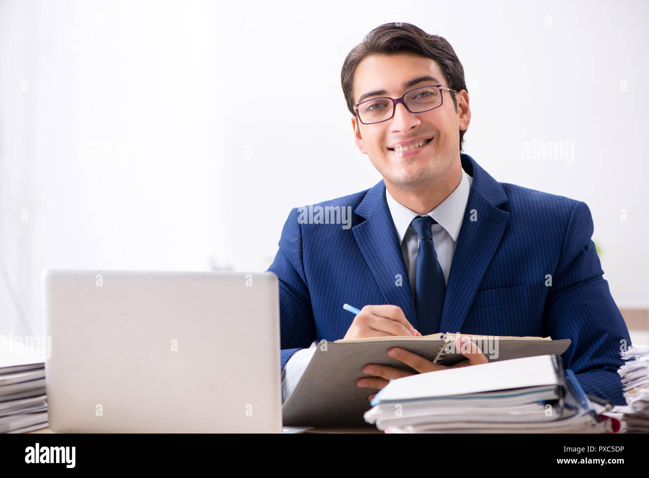 Busy man complaining about his workload Stock Photo - Alamy