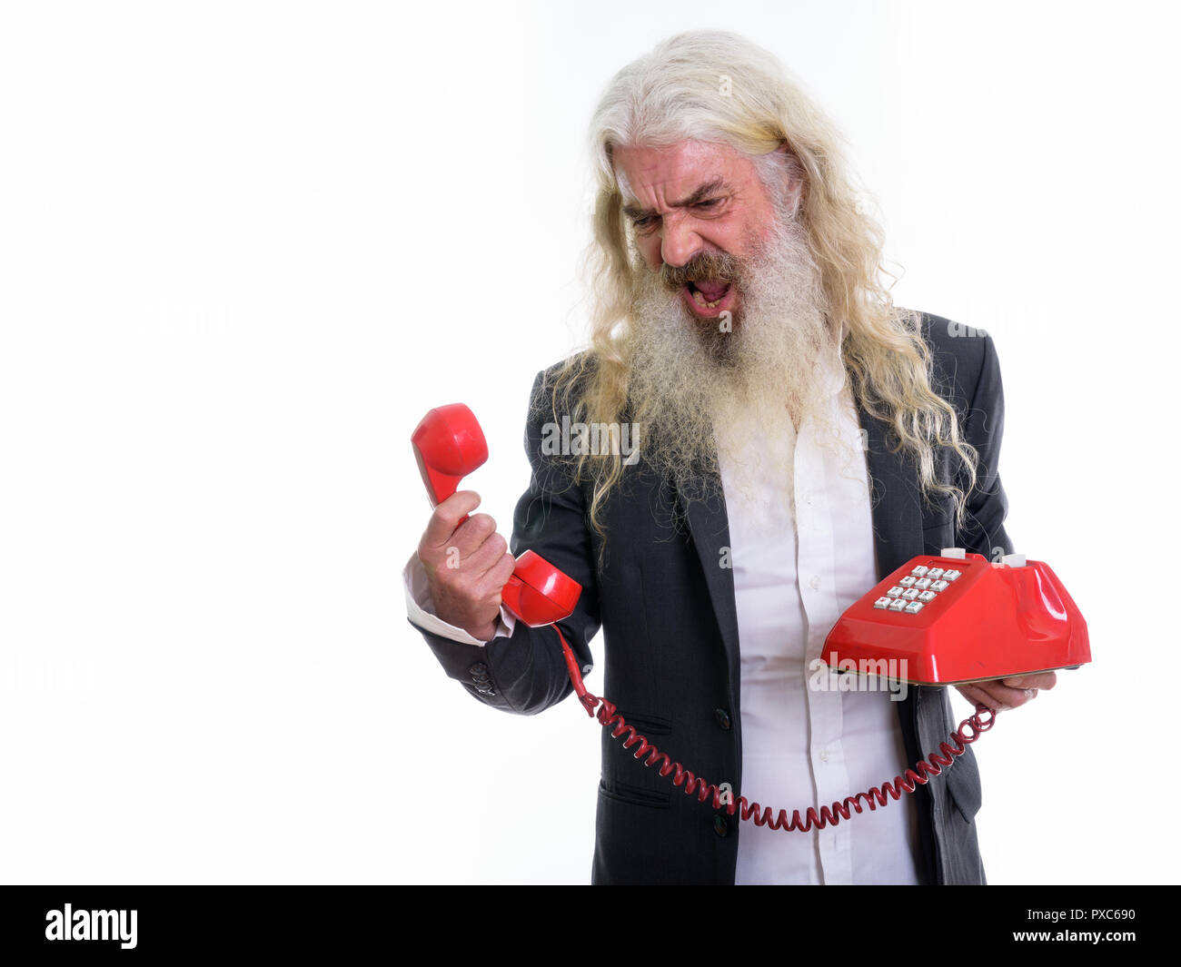 Angry mature bearded man holding hi-res stock photography and images ...