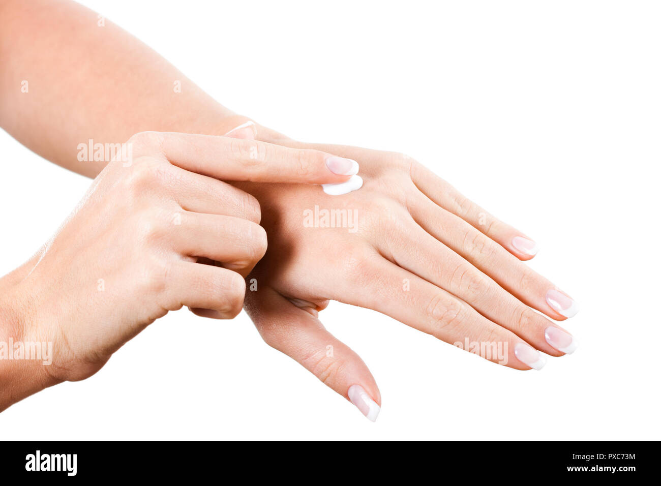 Applying moisturizer on hand Stock Photo - Alamy