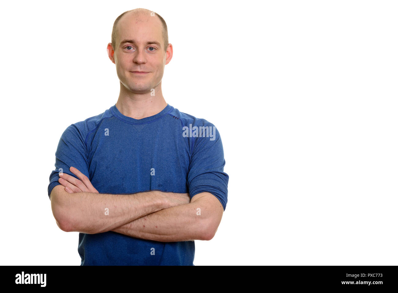 Confident bald Caucasian man with arms crossed Stock Photo - Alamy Confident bald Caucasian man with arms crossed Stock Photo - Alamy