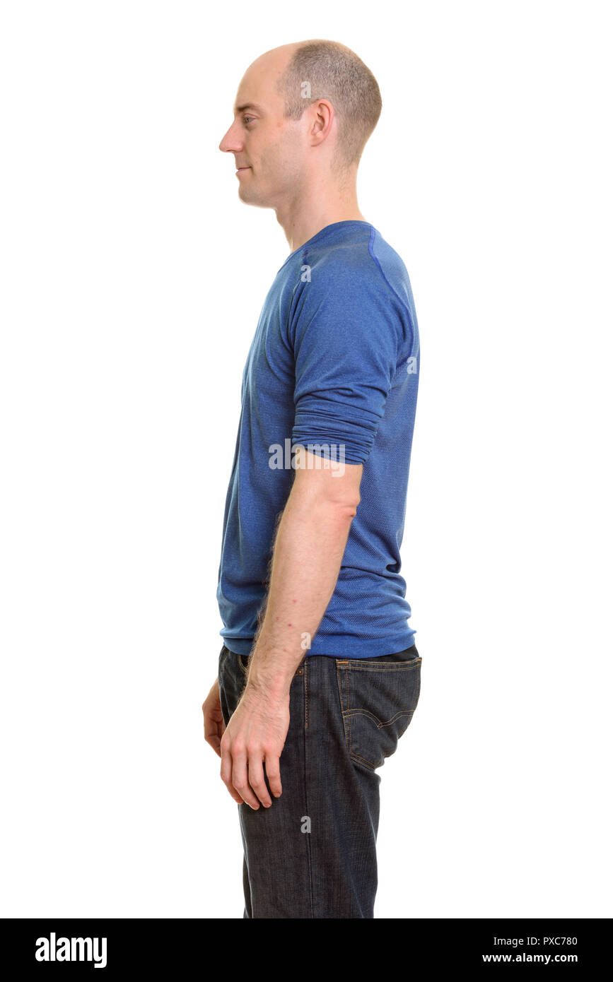 Profile view of bald Caucasian man standing Stock Photo - Alamy
