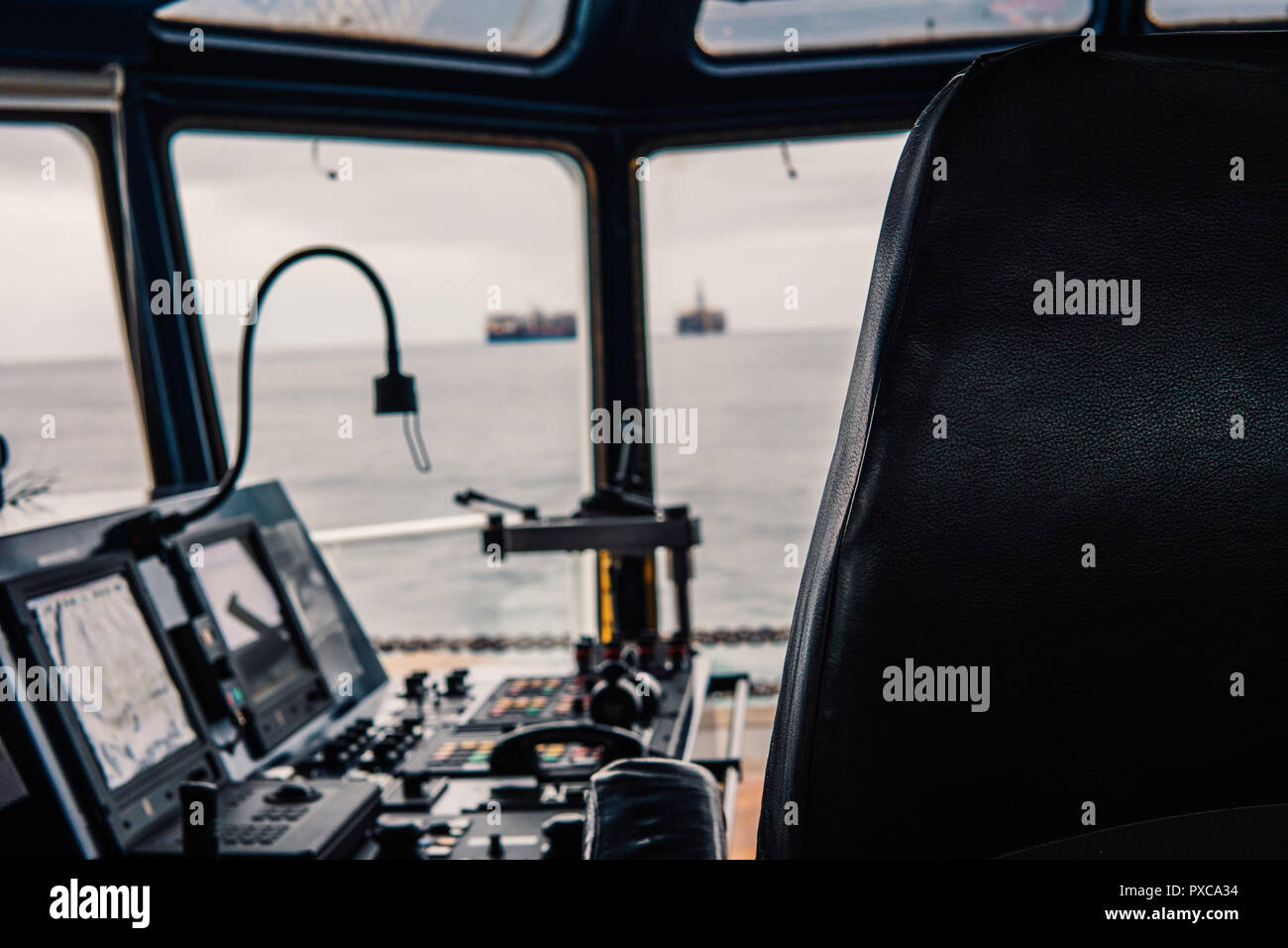 Bridge ship equipment. telegraph handles vhf radio, navigation devices ...