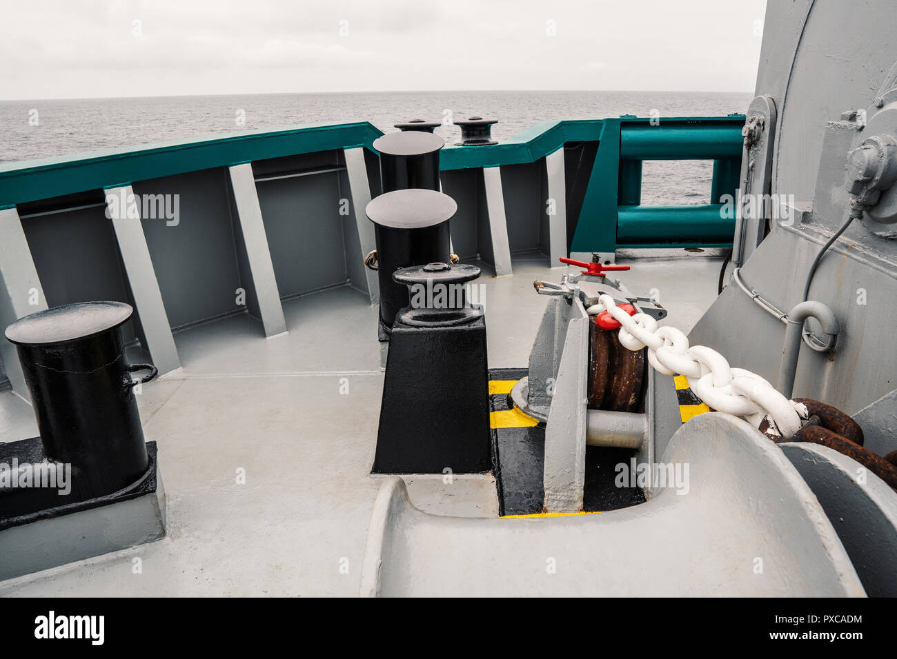 mooring equipment of ship. Mooring bollards, capstan and winch Stock ...