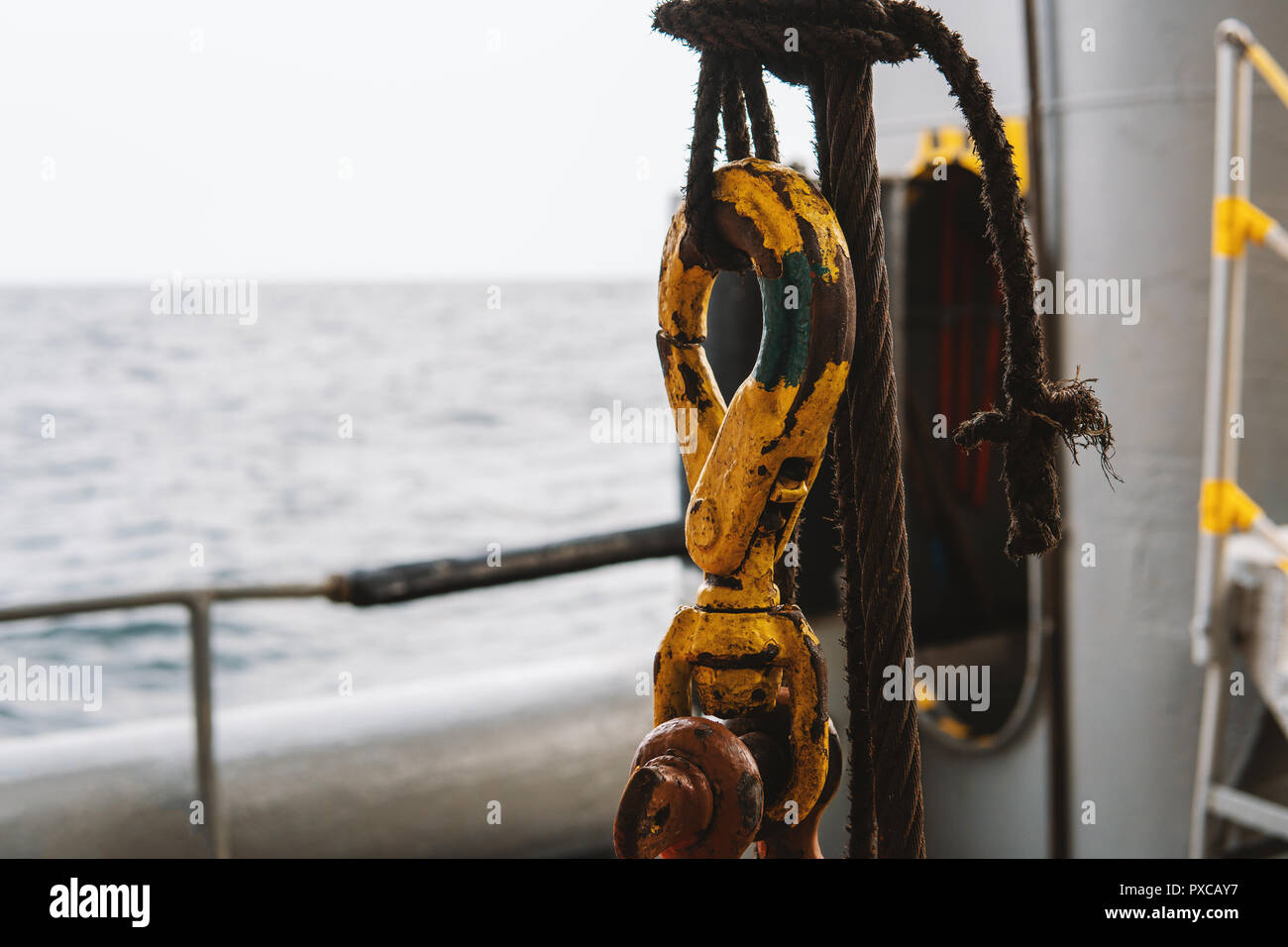 Offshore crane hook is secured for sea passage Stock Photo - Alamy
