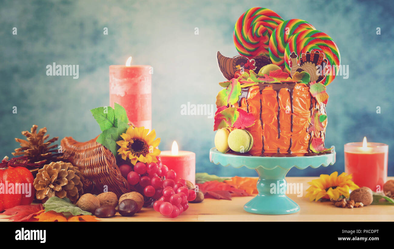 On trend Thanksgiving candyland novelty drip cake with colorful Fall ...