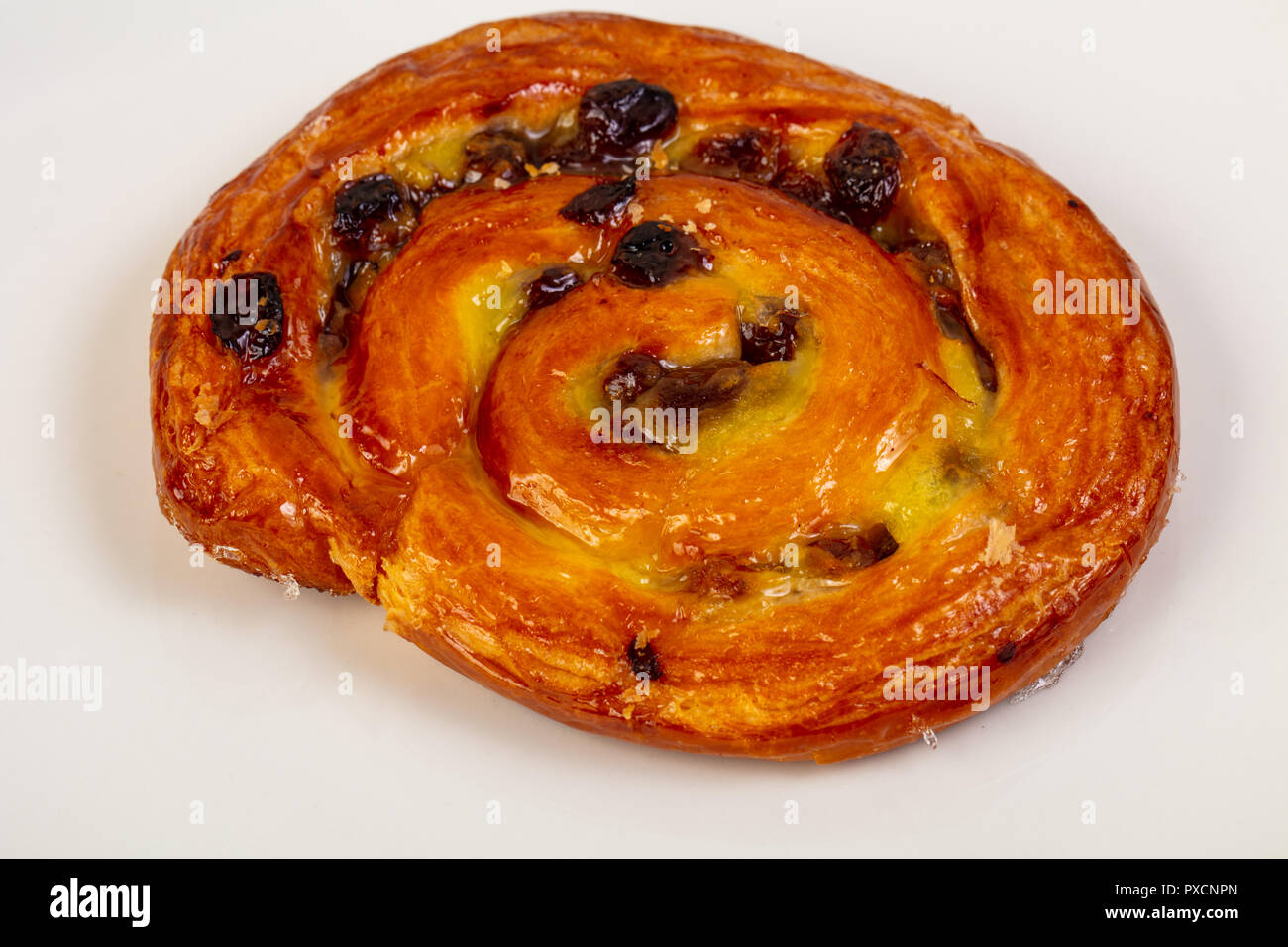 Baked snail with raisin and shugar Stock Photo - Alamy