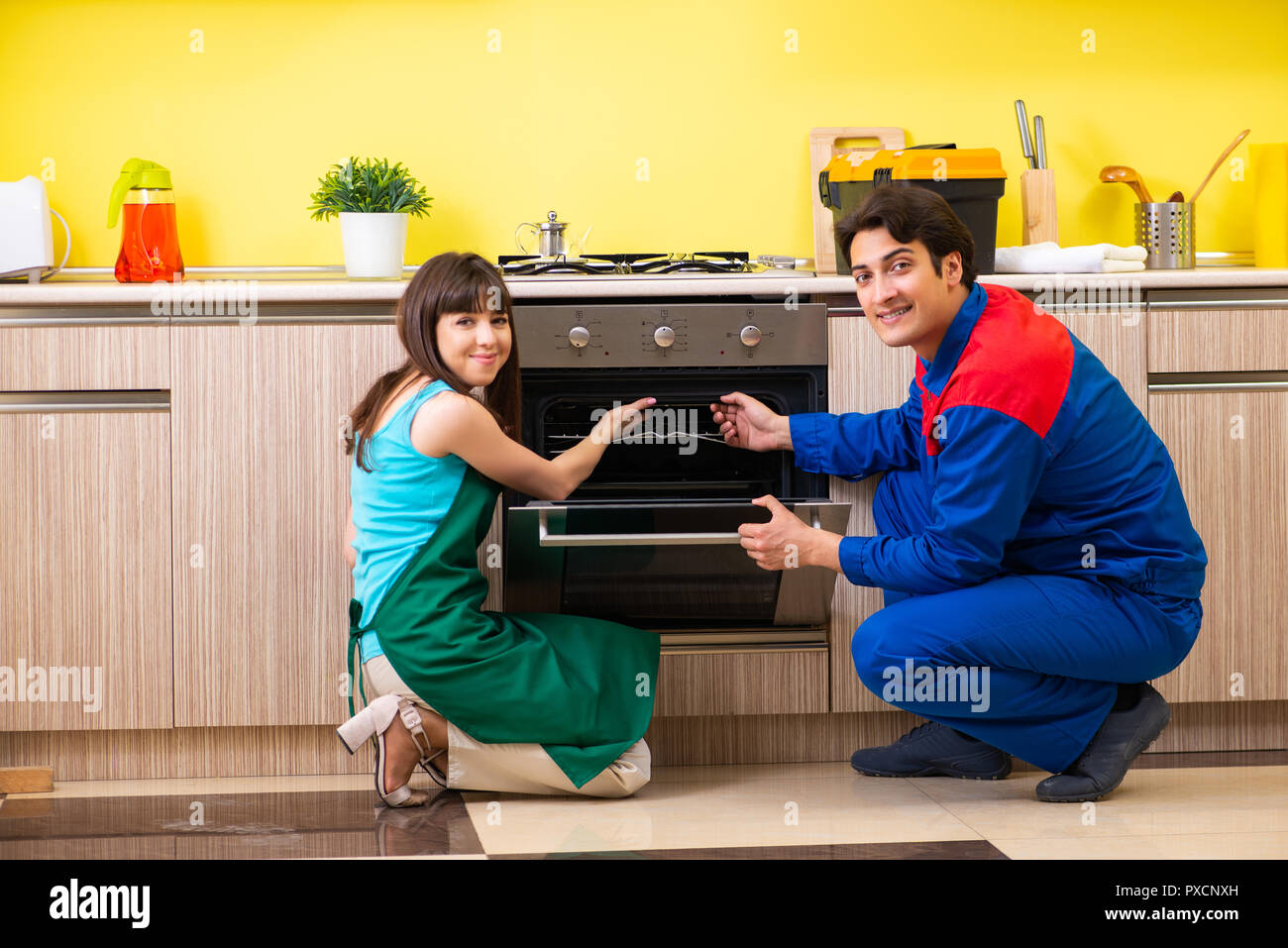 Appliance Repair Woman Stock Photos & Appliance Repair Woman Stock ...