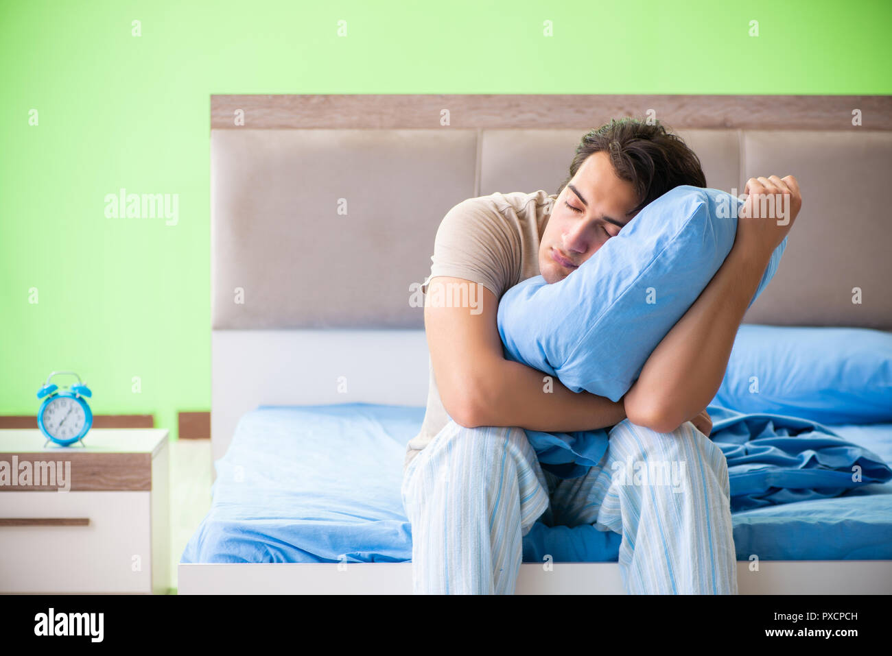 Man suffering from sleeping disorder and insomnia Stock Photo - Alamy