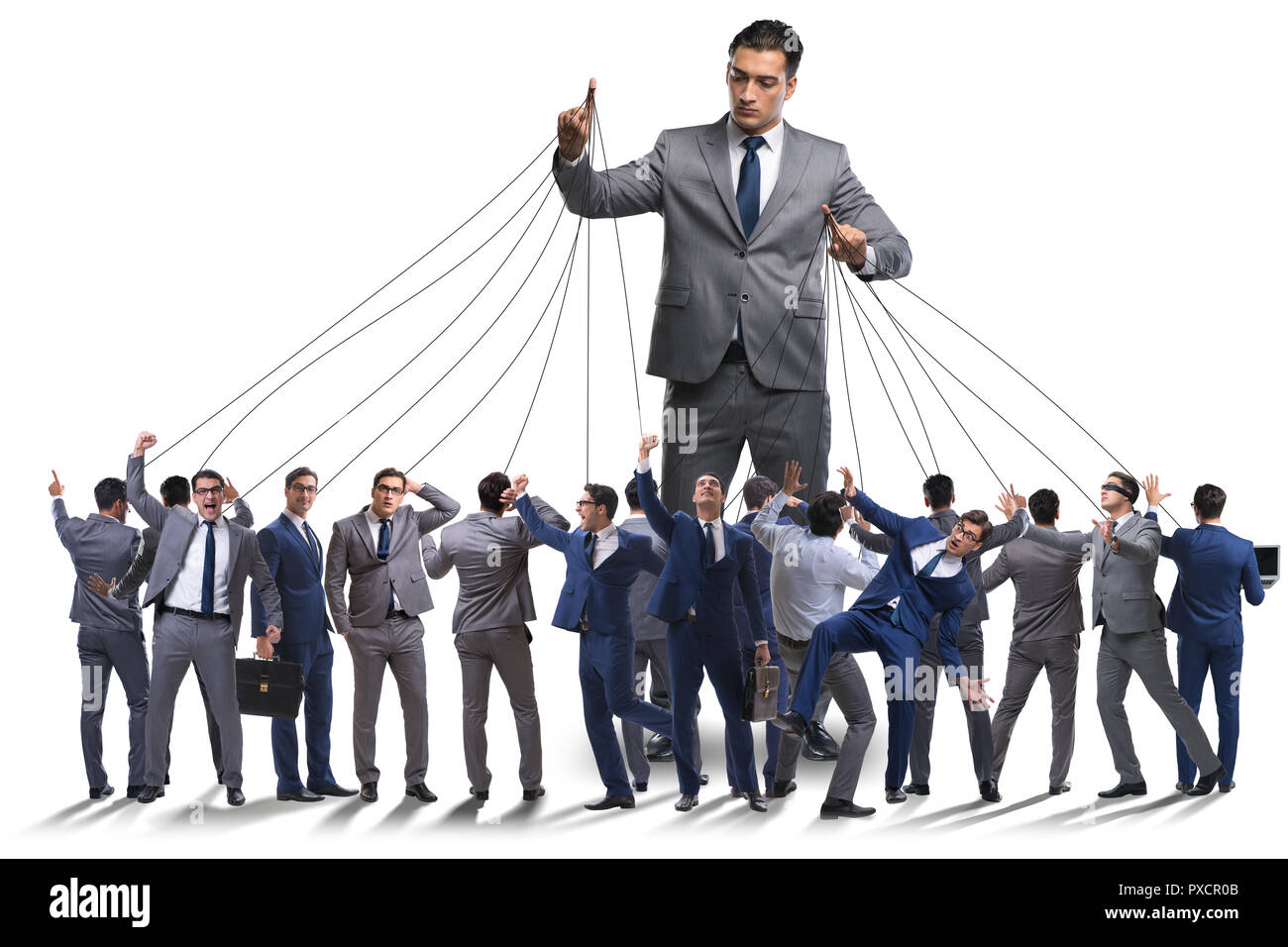 Boss employee manipulating his staff in business concept Stock Photo ...