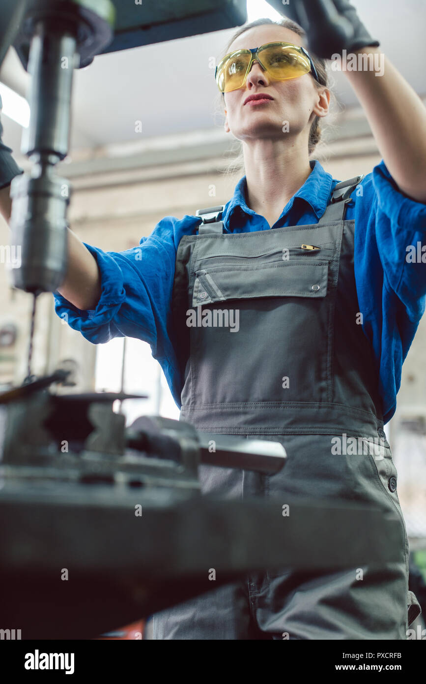 Female production worker using hi-res stock photography and images - Alamy