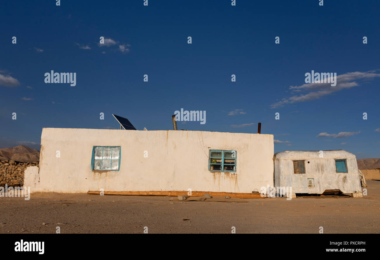 Typical Pamiri architecture is a whitewashed house, this one in ...