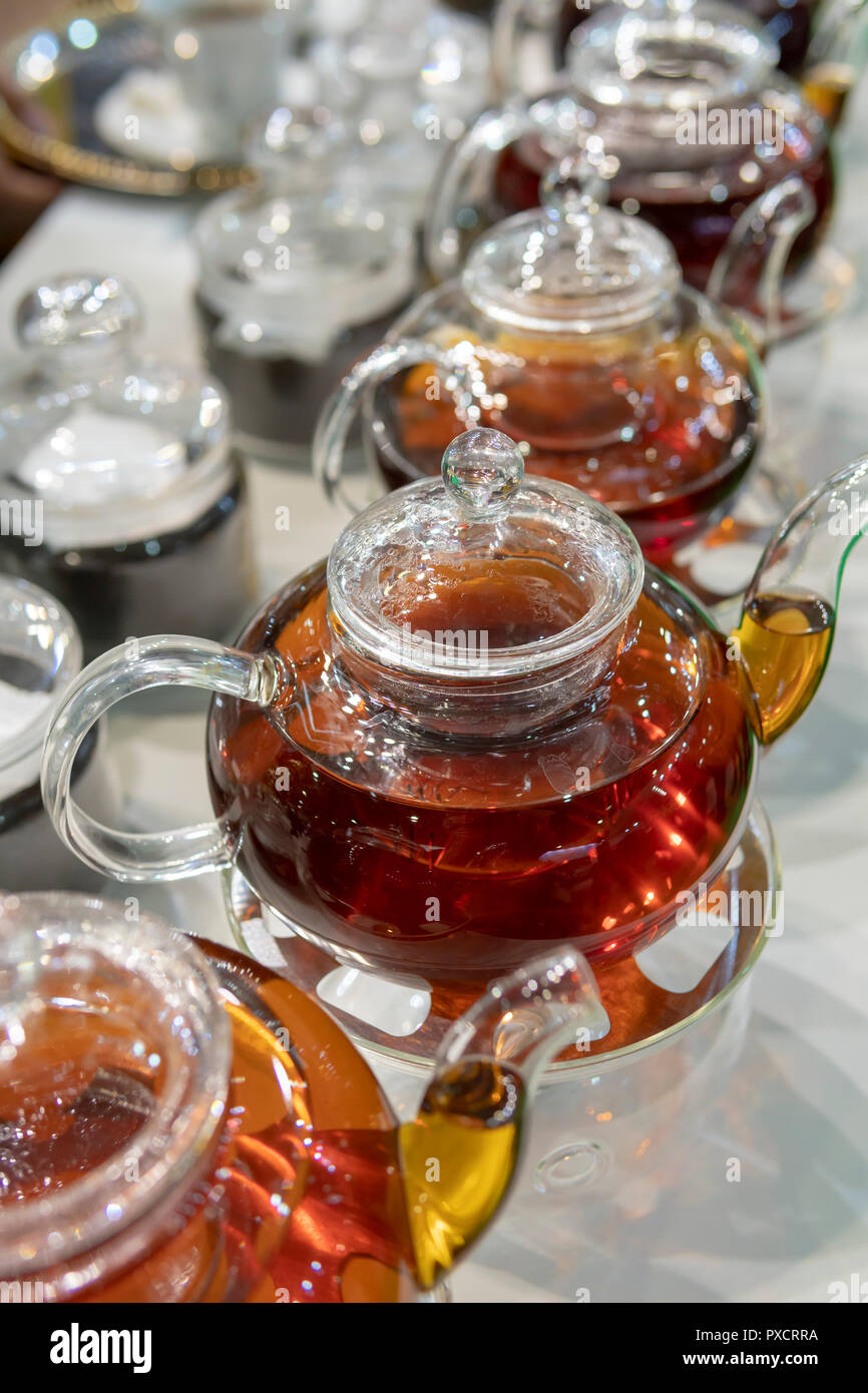 Tea in a glass transparent teapot Stock Photo - Alamy