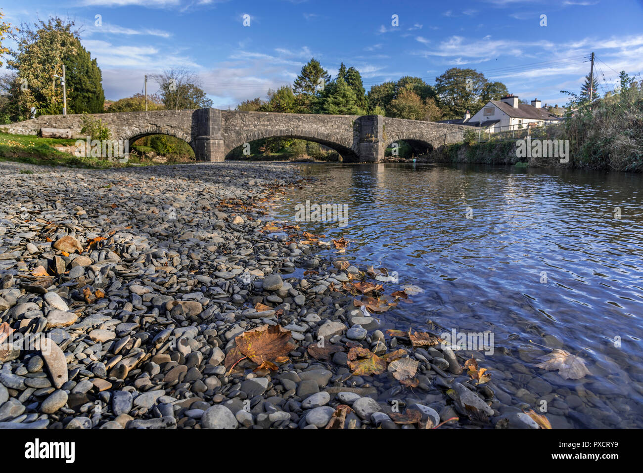 Stone archedbridge at Llanfair Talhaiarn. North Wales. Auntimn colours ...