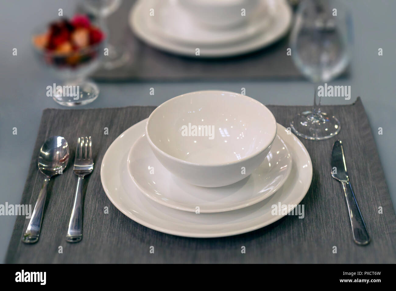 Table setting in a restaurant Stock Photo - Alamy