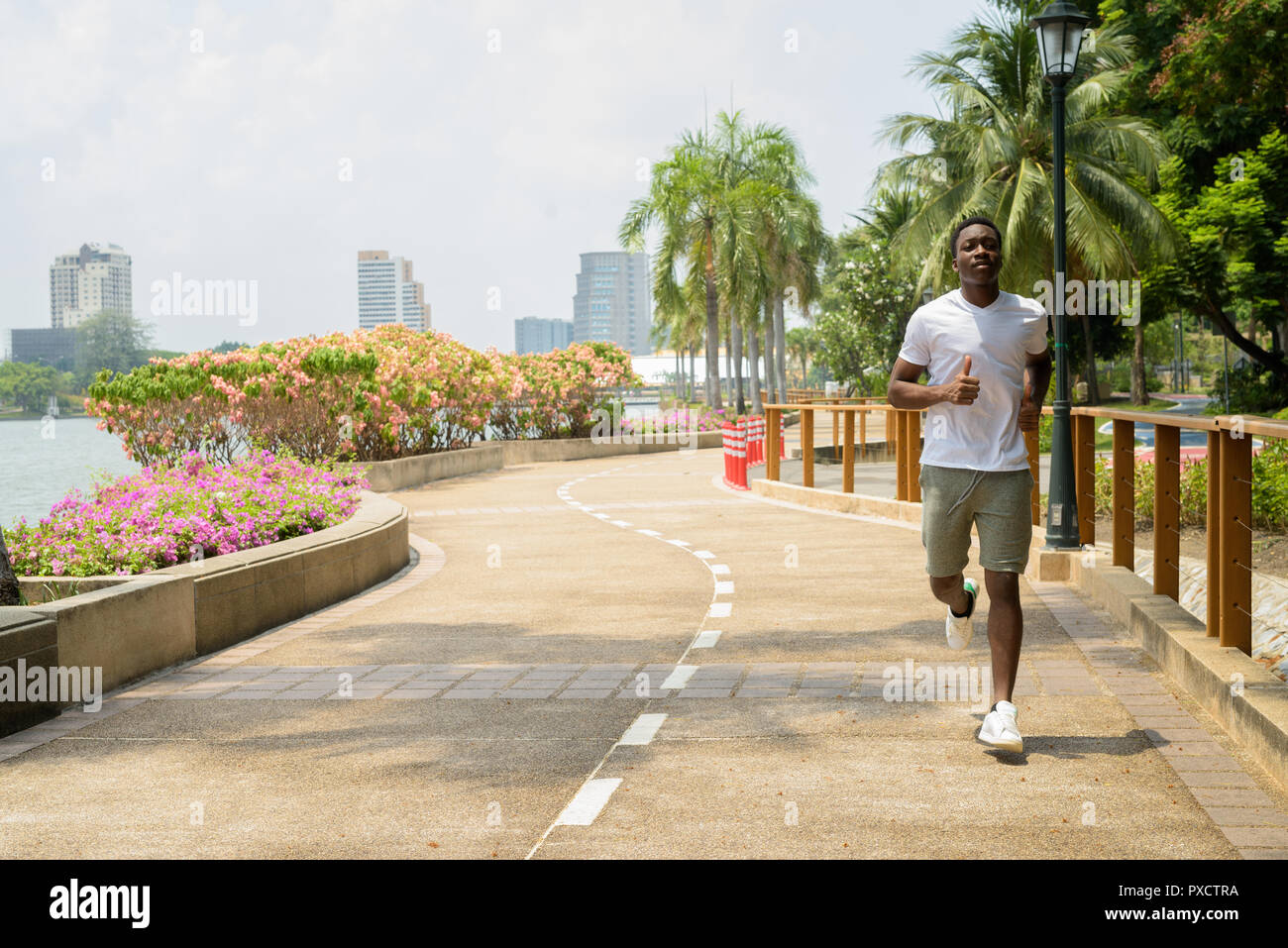 African american man running hi-res stock photography and images - Alamy
