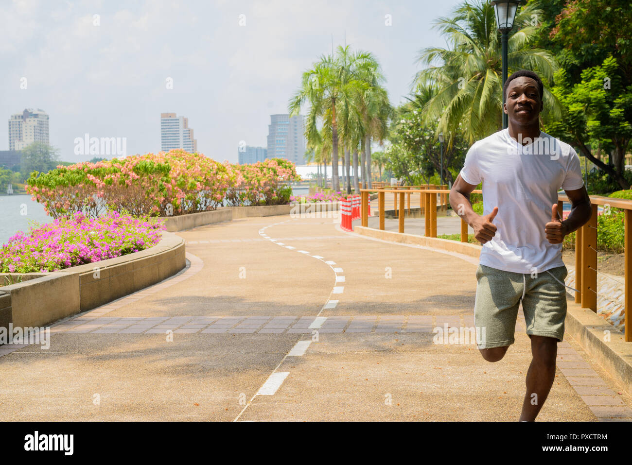 African american man running hi-res stock photography and images - Alamy