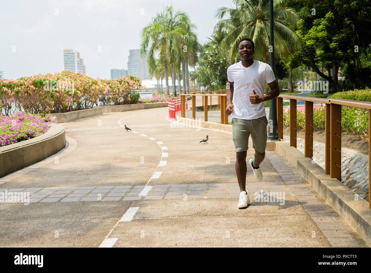 African american man running hi-res stock photography and images - Alamy