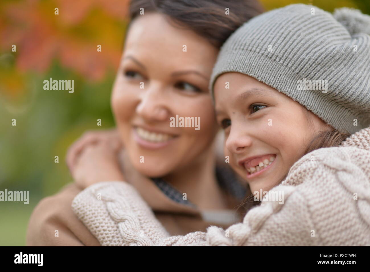 Child hugging adult hi-res stock photography and images - Alamy