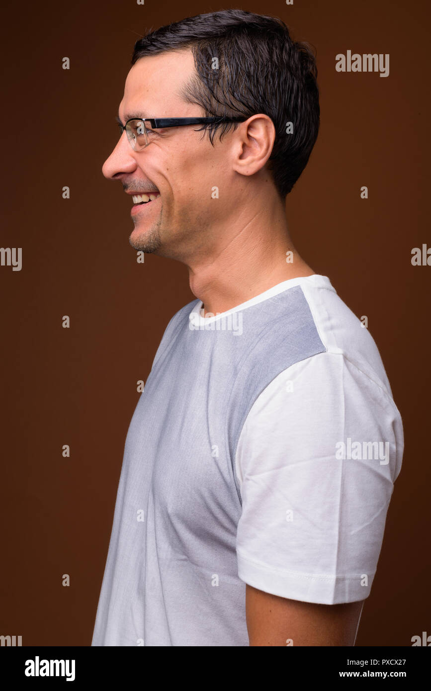Closeup profile view happy handsome hi-res stock photography and images ...
