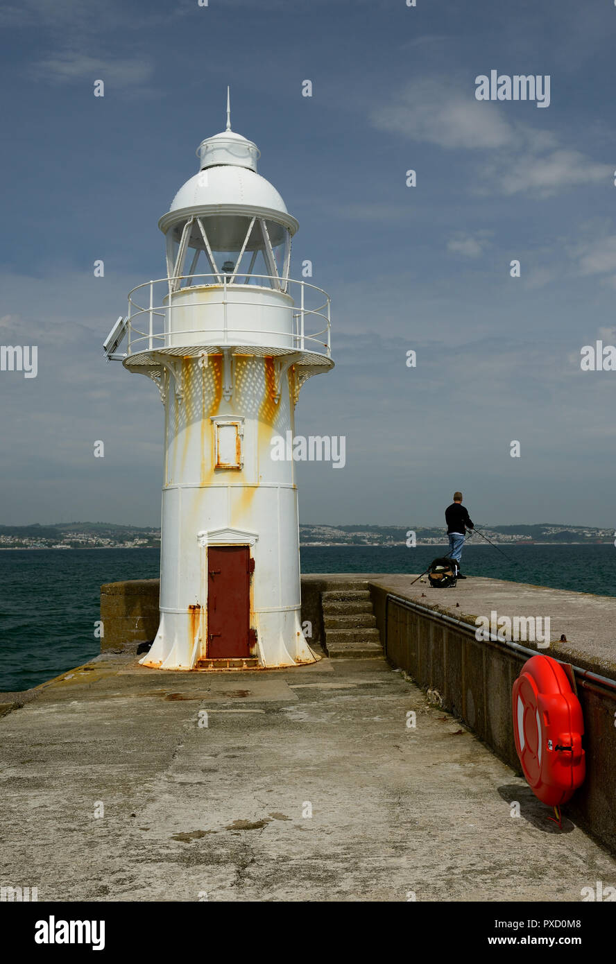 Lighthouse at the end of the harbour wall at Brixham Stock Photo - Alamy