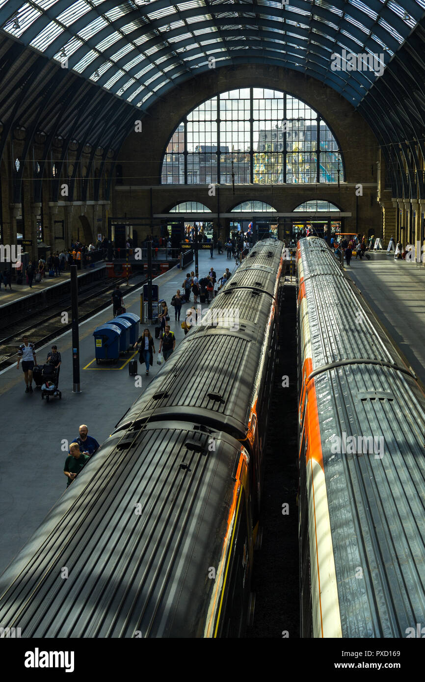 View of the main platforms at King's Cross station with trains and ...