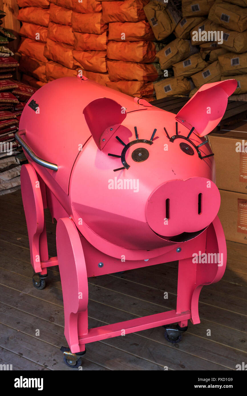 metal pig shape bbq colour pink tromso norway Stock Photo - Alamy