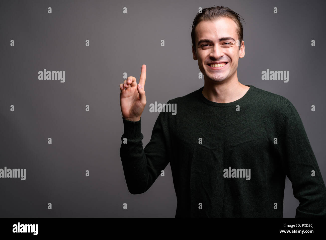 Man showing finger up hi-res stock photography and images - Alamy