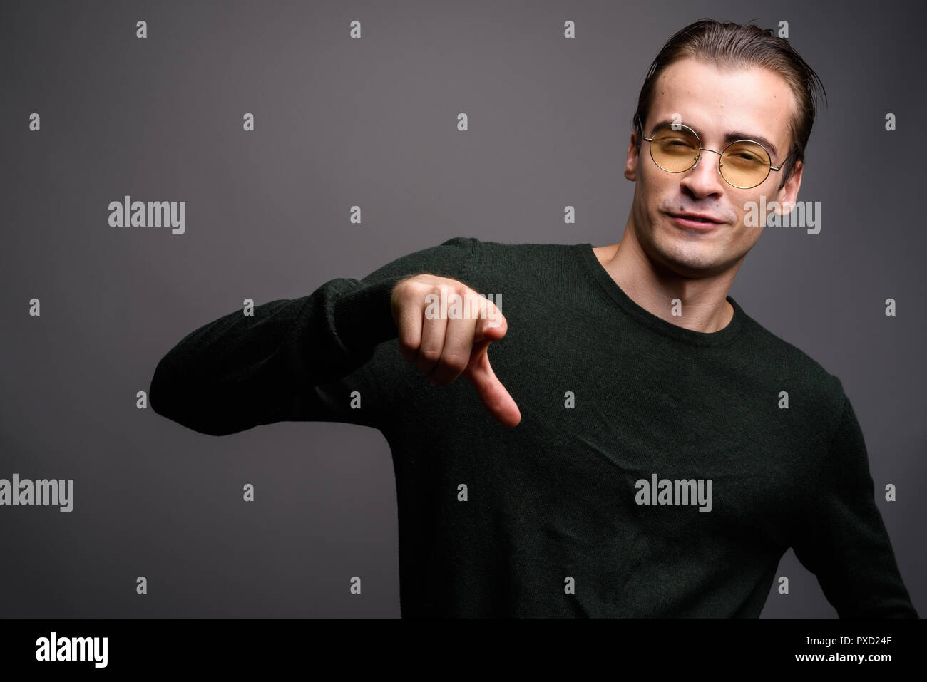 Young handsome man pointing finger at camera Stock Photo - Alamy