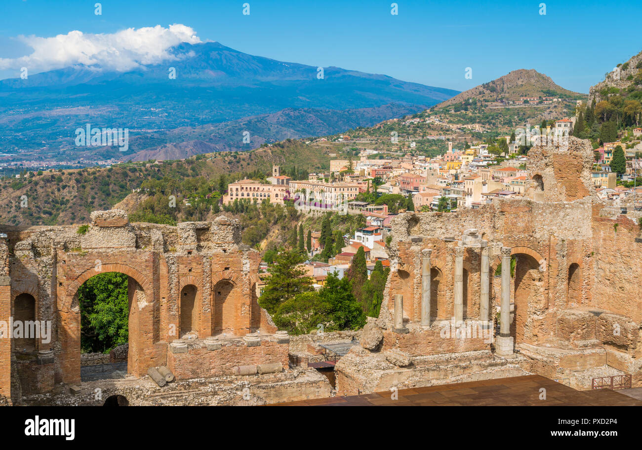 Ruins of the Ancient Greek Theater in Taormina with the Etna volcano in ...
