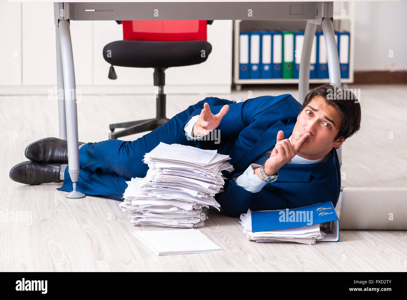 Tired exhausted businessman working overtime in office Stock Photo - Alamy