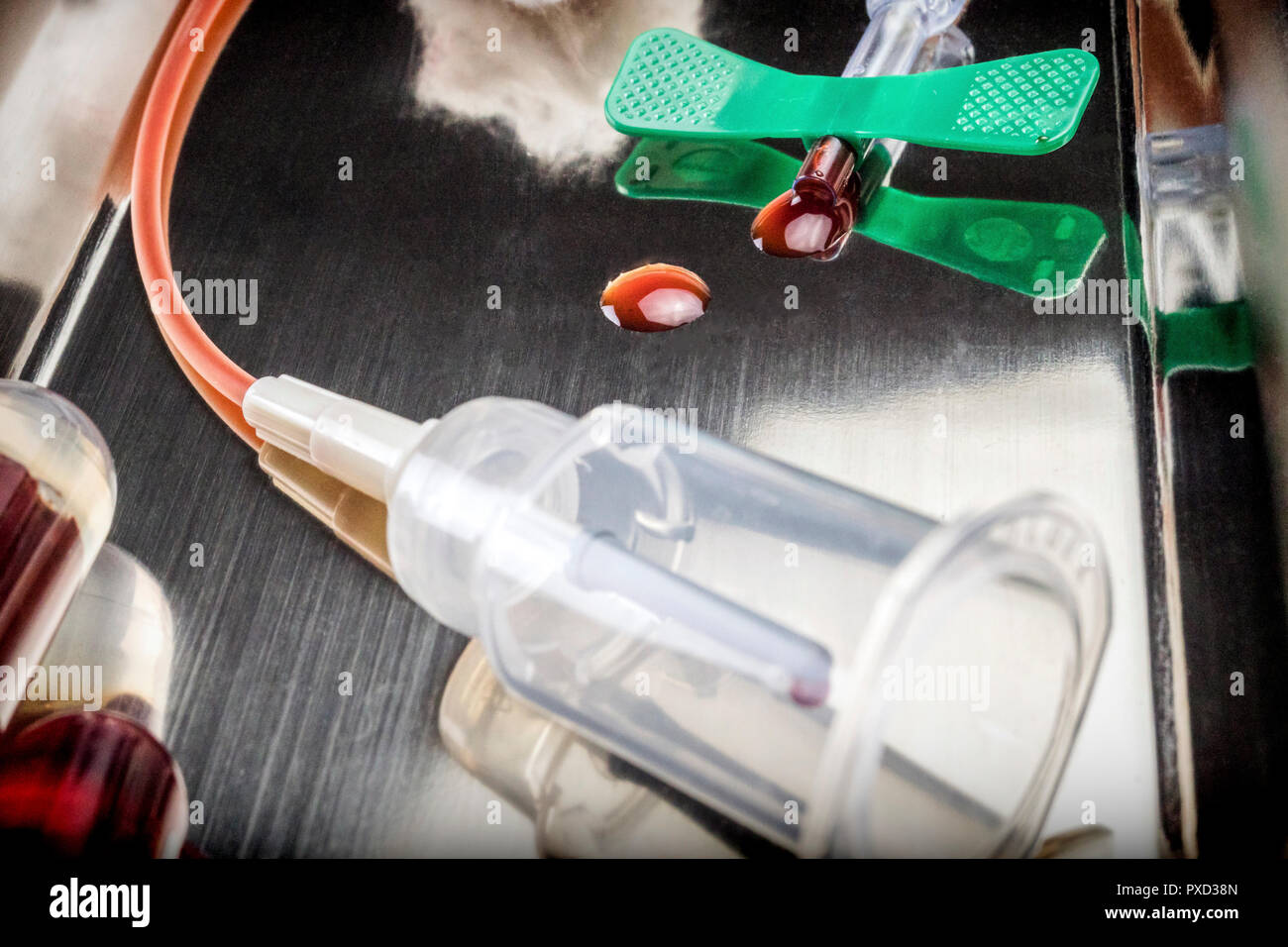 Blood extraction equipment to a donor in a hospital, conceptual image ...