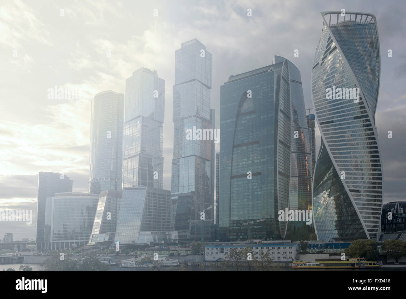 Skyscrapers in the rays of sunset Stock Photo - Alamy