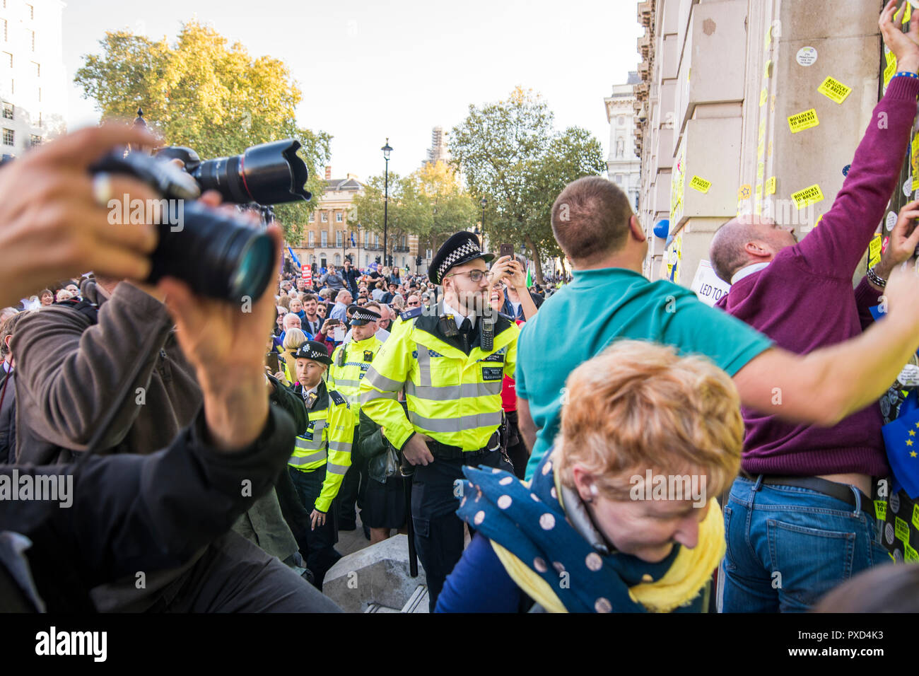 Police move demonstrators away from the Cabinet Office after thousands ...