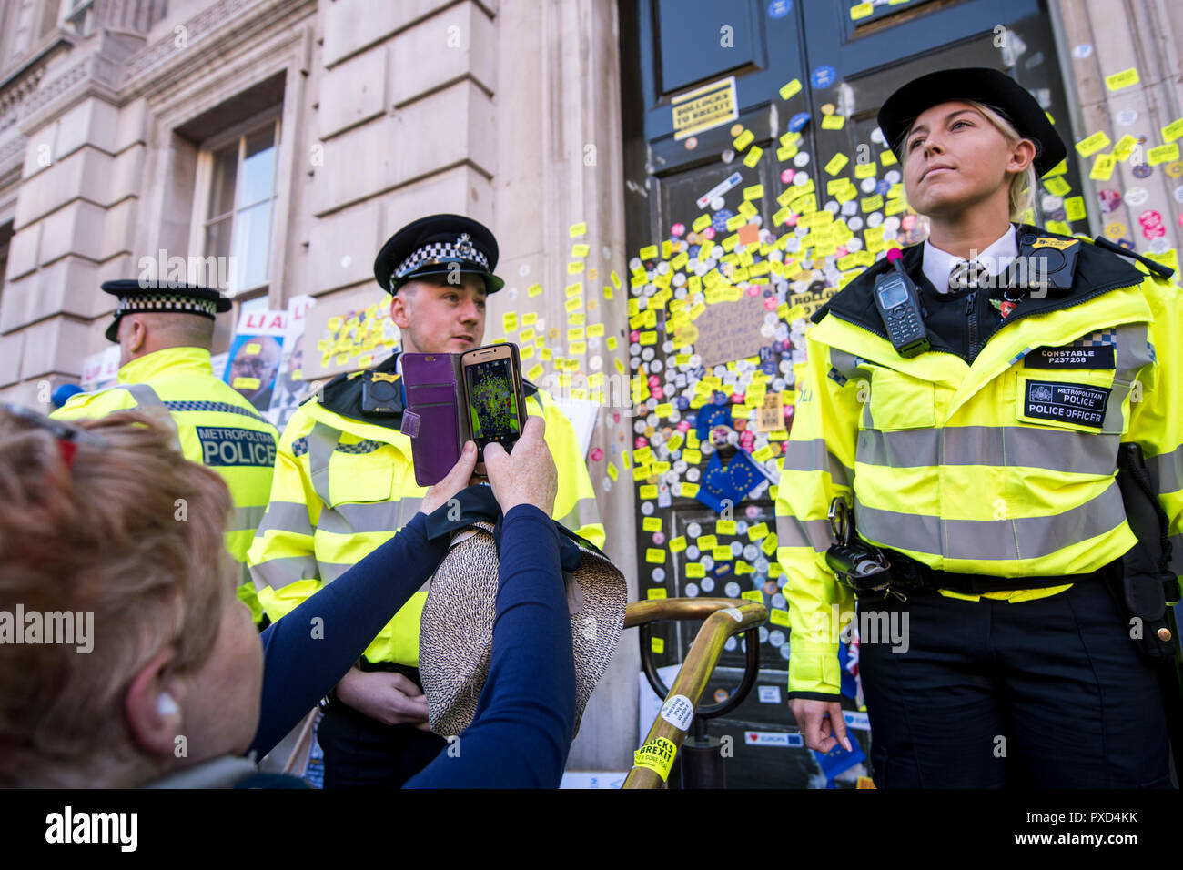 Police move demonstrators away from the Cabinet Office after thousands ...