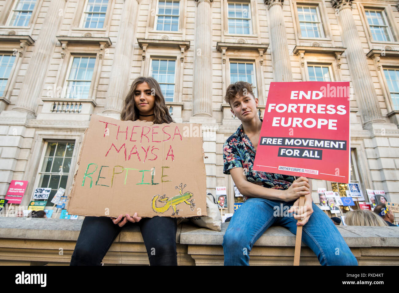 Two teenagers pose with placards during the People's Vote march on ...