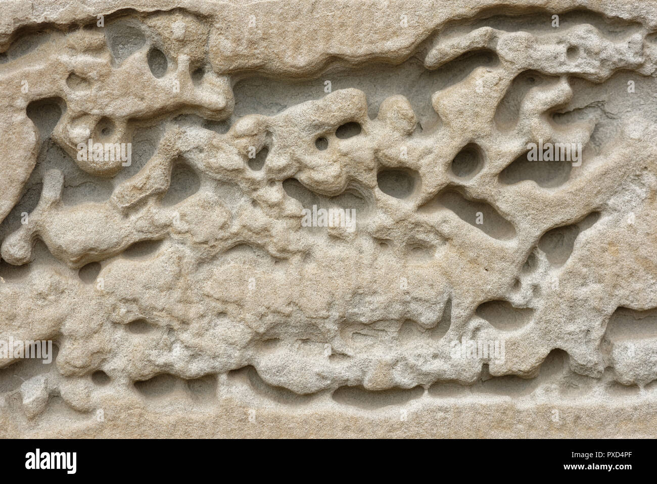 Natural limestone with rugged surface texture Stock Photo - Alamy