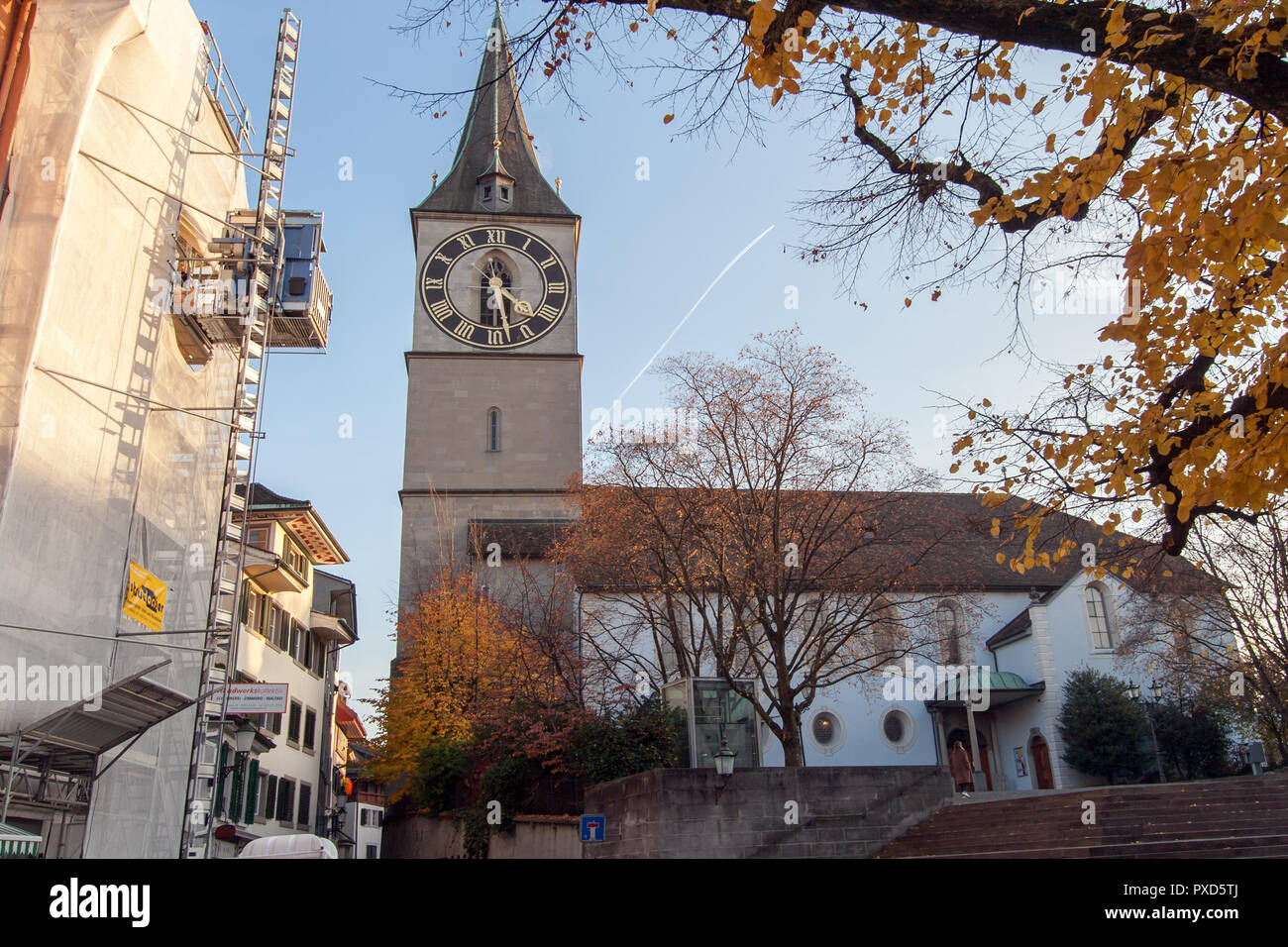 ZURICH, SWITZERLAND - 28 OCTOBER 2015 : St. Peter Church and autumn ...