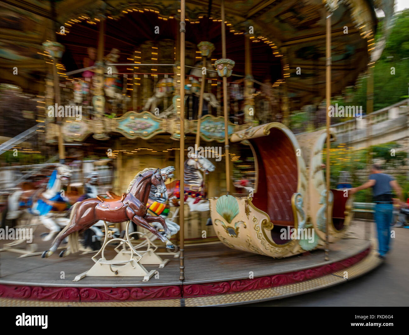 Paris, France - August 12, 2018 : Carousel merry-go-round ride with ...