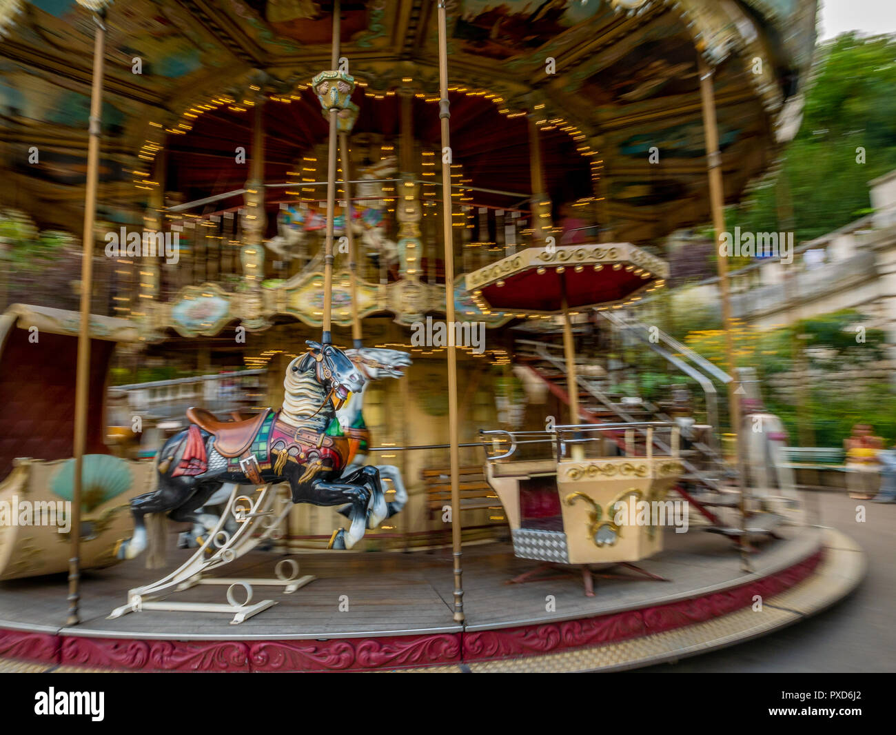 Paris, France - August 12, 2018 : Carousel merry-go-round ride with ...