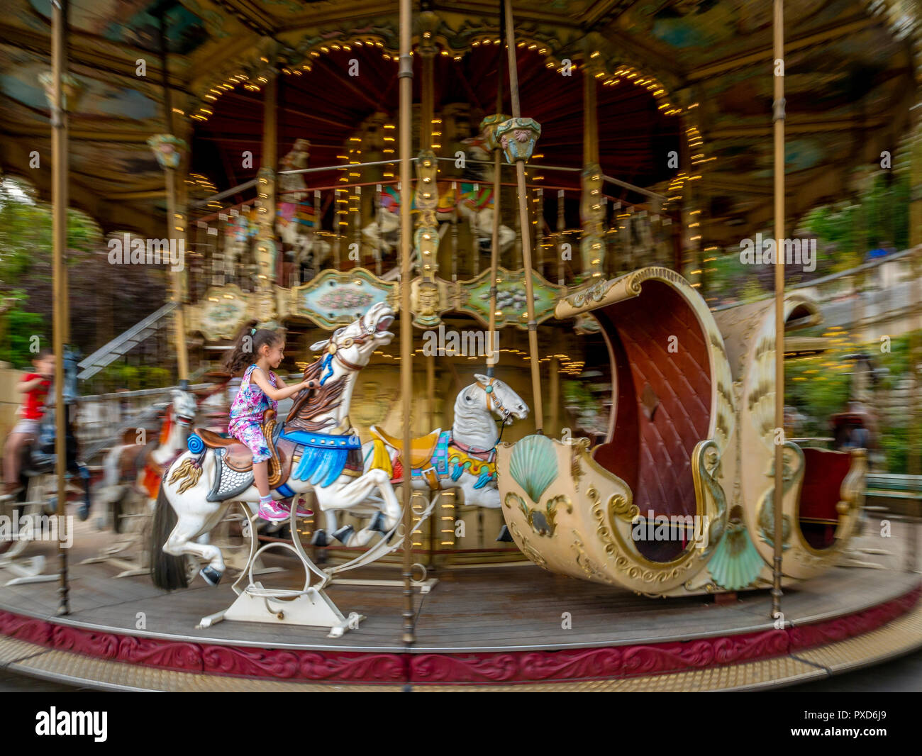 Paris, France - August 12, 2018 : Carousel merry-go-round ride with ...